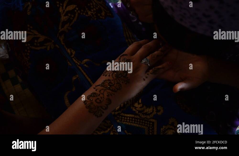 Henna hand tattoo with tradicional ink in the Sahara Desert, Morocco ...