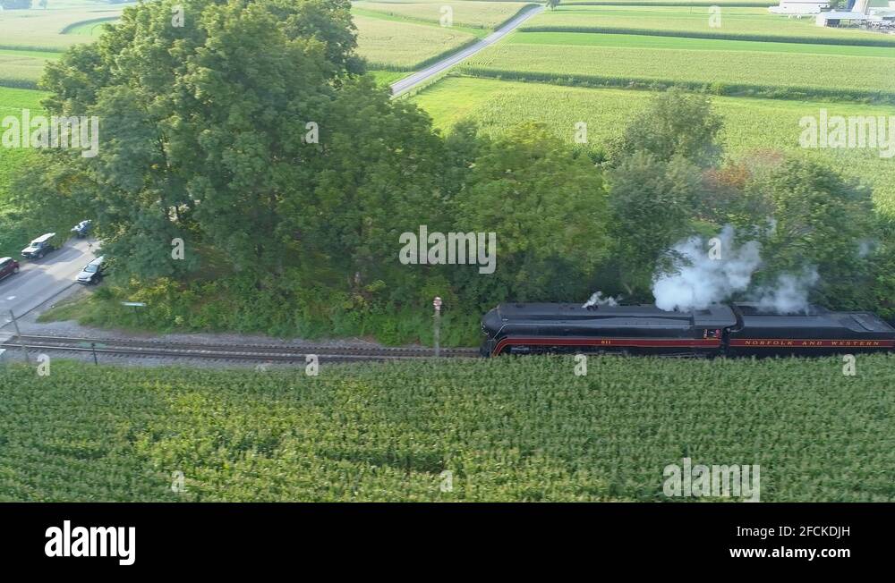 An Aerial View of a Steam Train no 611 Puffing Smoke Through Farm Stock ...