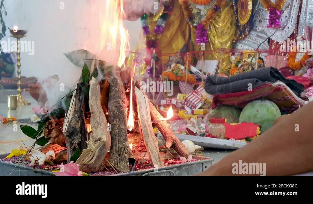 yajna, a ritual done in hindu worship where wood is set on fire with ...