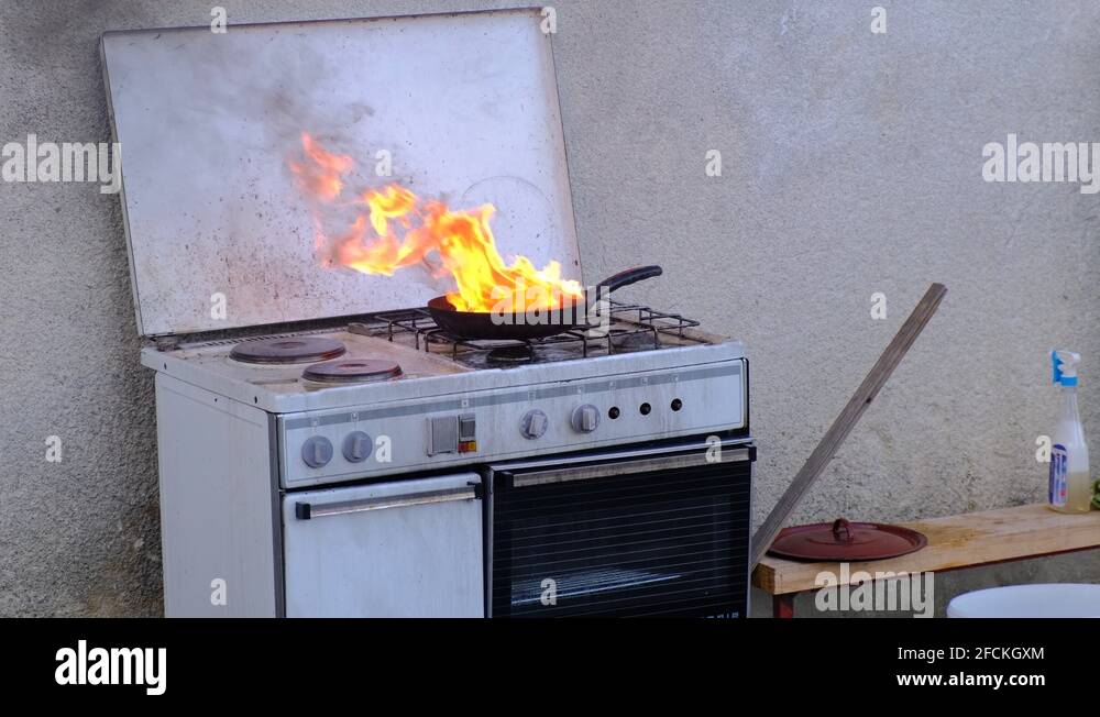 Fat fire kitchen Stock Videos & Footage - HD and 4K Video Clips - Alamy