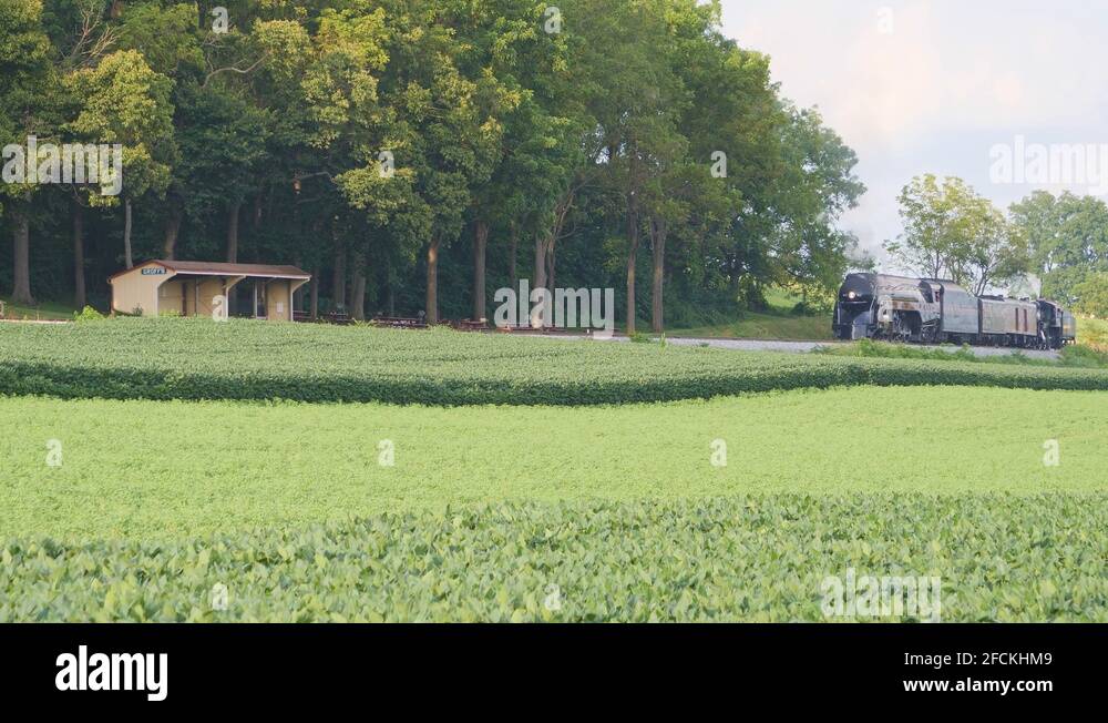 An Aerial View of a Steam Train no 611 Puffing Smoke Through Farm Stock ...