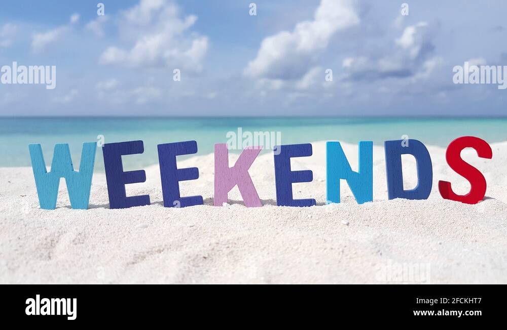 Static shot of the word weekends on a sandy beach in the Philippines 4K ...