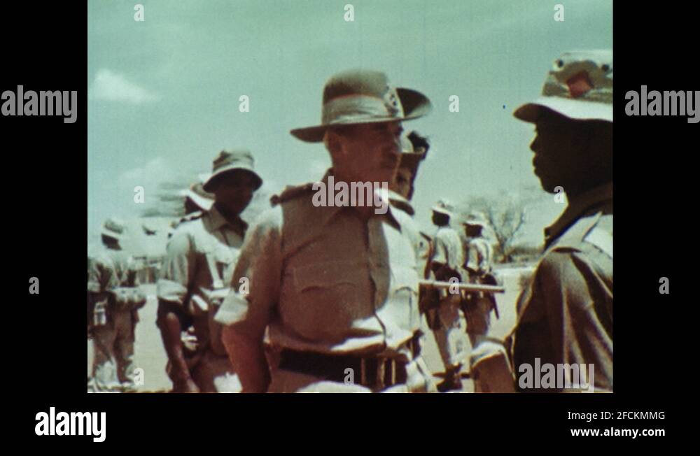 1960s: AFRICA: white men settle in Africa. Men in uniform. Africans in ...