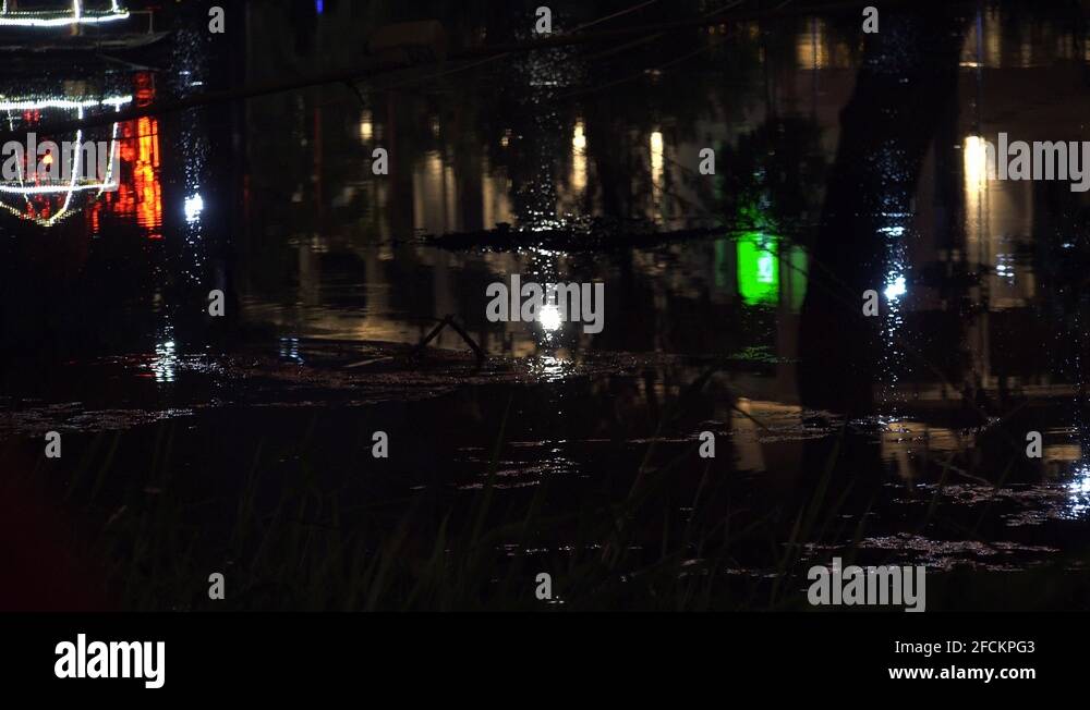 Puddle reflection night Stock Videos & Footage - HD and 4K Video Clips ...