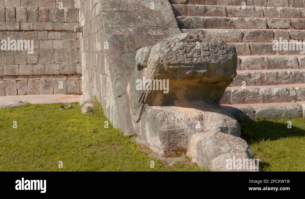 Ancient Aztec sculpture and sacred temple pyramid, tilt up Stock Video ...