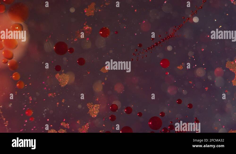 Expanding galaxy splash blood red splatter texture bokeh background ...