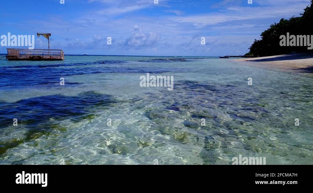 Wooden raft floating on crystal clear water of philippine sea. Tracking ...