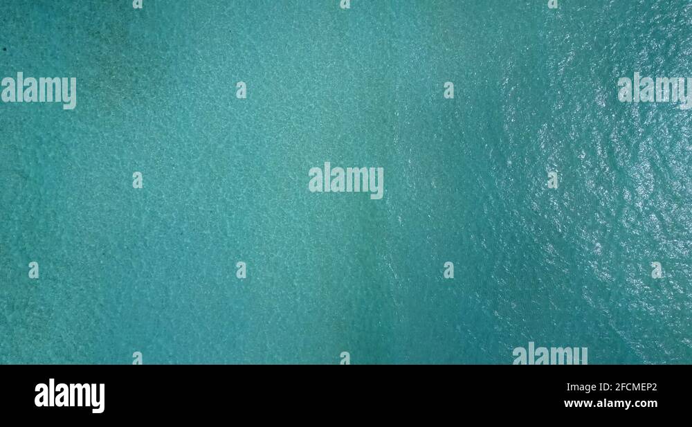 Bird's eye tracking footage of crystal clear waters in Malaysia 4K ...