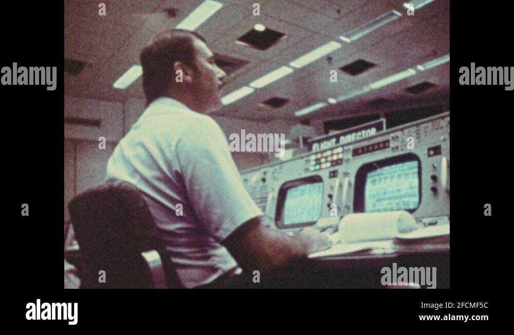 1970s: People sit at monitors in control room Stock Video Footage - Alamy