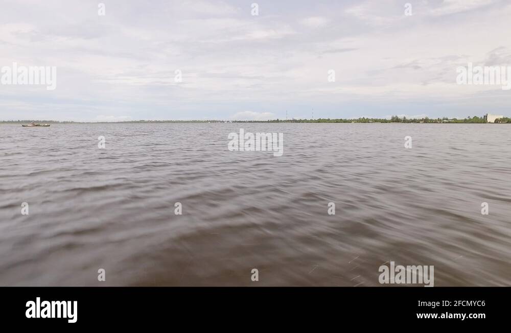 Boat ride on jungle river Indonesia Stock Video Footage - Alamy
