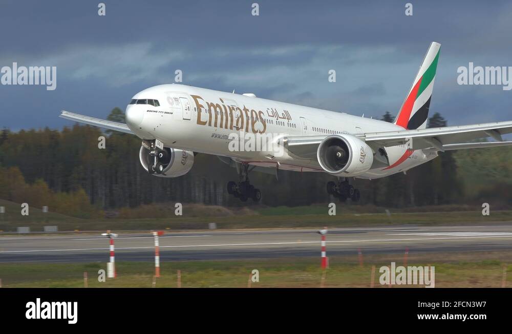 huge airplane boeing 777 close up stunning view landing gear slow ...