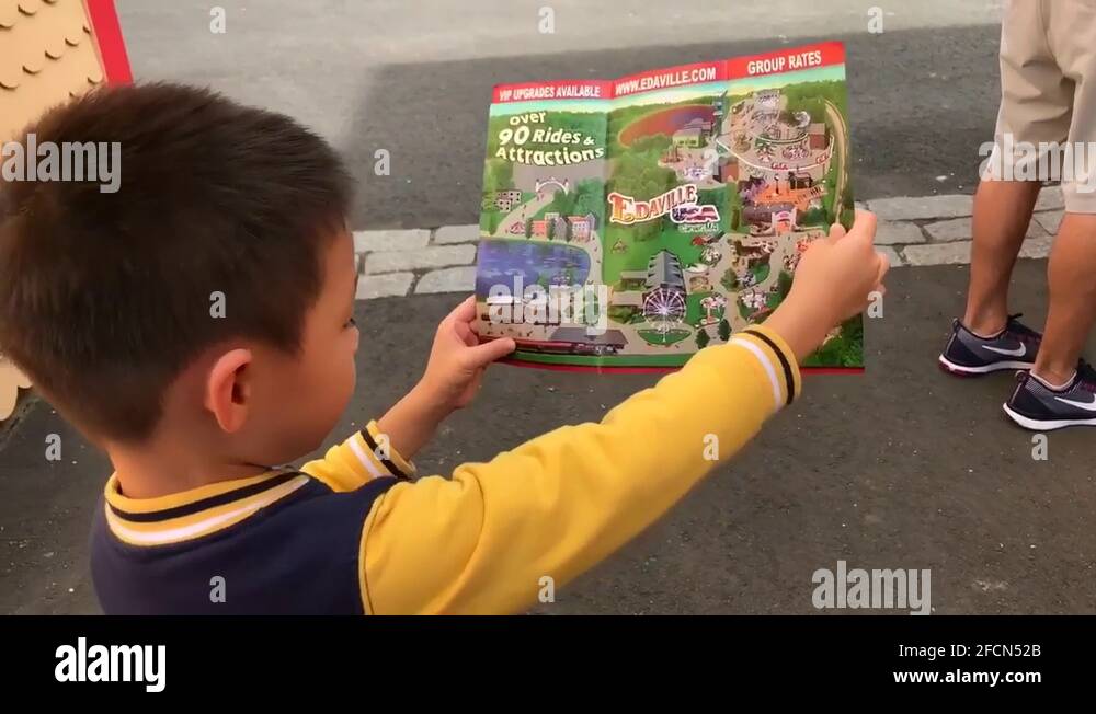 A boy child reading a map Stock Videos & Footage - HD and 4K Video ...