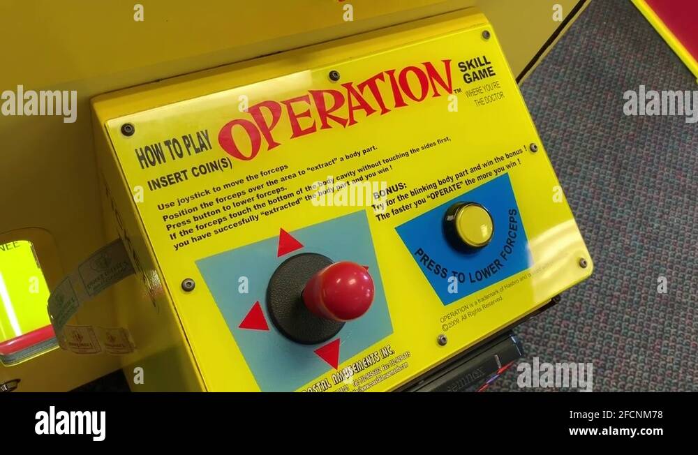 An Arcade Version Of The Classic Old School Board Game Called Operation Stock Video Footage Alamy