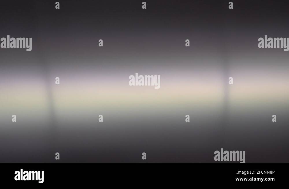 A white light blinking on a roof that creates a beautiful effect. The ...