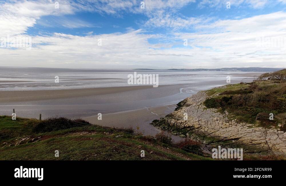 Lake district timelapse overlooking rugged coastal cliff edge slope ...