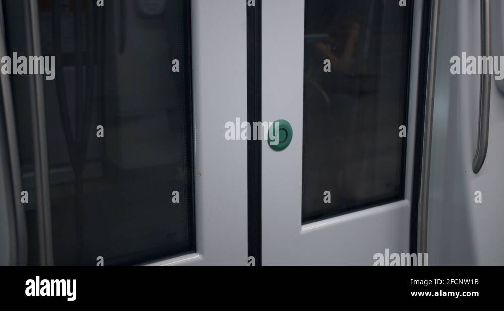 An interior view of the doors in the Barcelona subway. Close up video ...