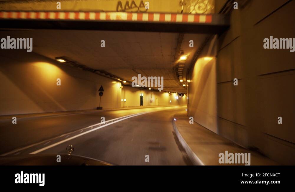 FPV of Car driving trough tunnel at night with lights Stock Video ...