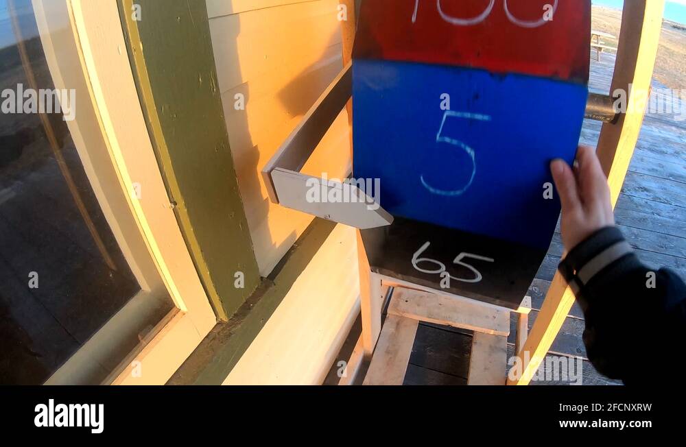 A home made spinning game wheel with numbers on it being spun around ...