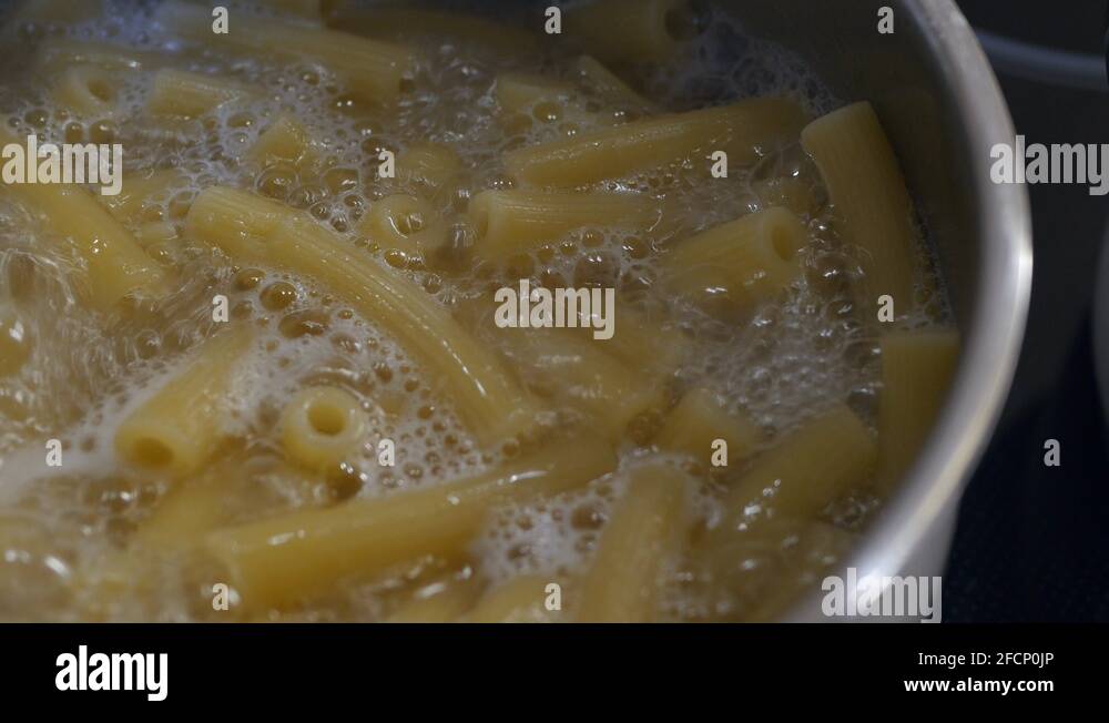Pasta Boiling Water In A Saucepan On Stove Stock Video Footage - Alamy