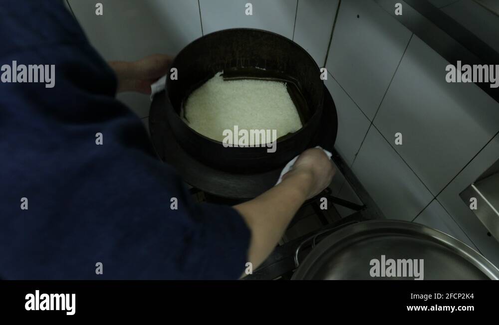 Carrying cooking pot Stock Videos & Footage - HD and 4K Video Clips - Alamy
