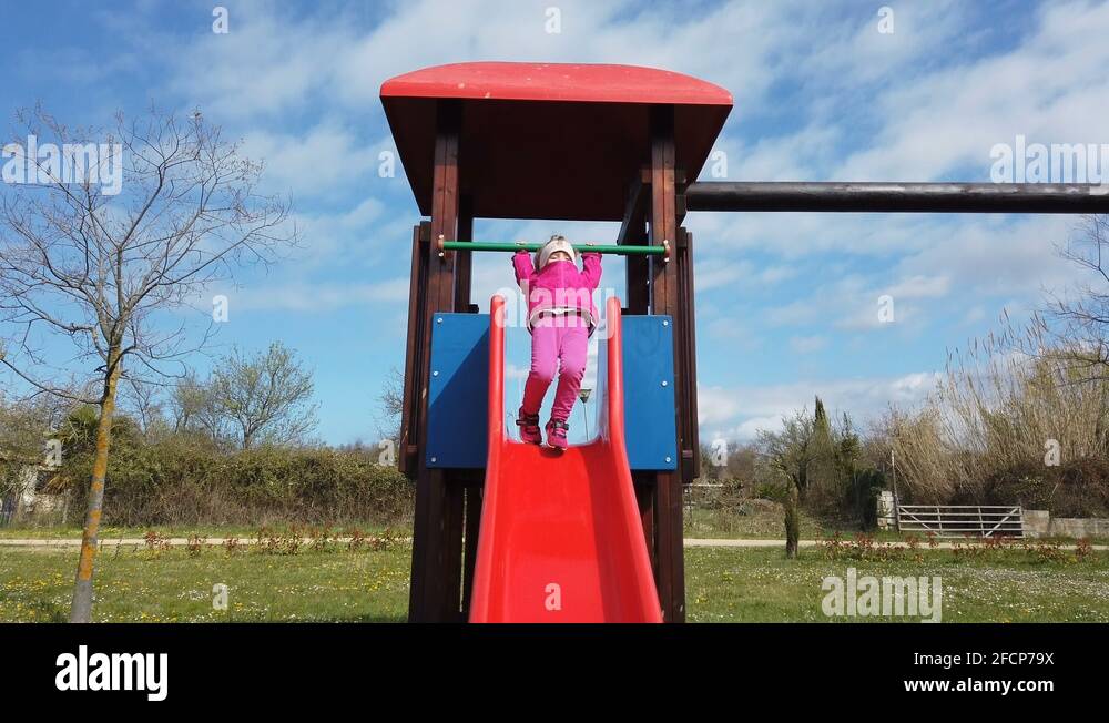 Young girl sliding down slide Stock Videos & Footage - HD and 4K Video ...