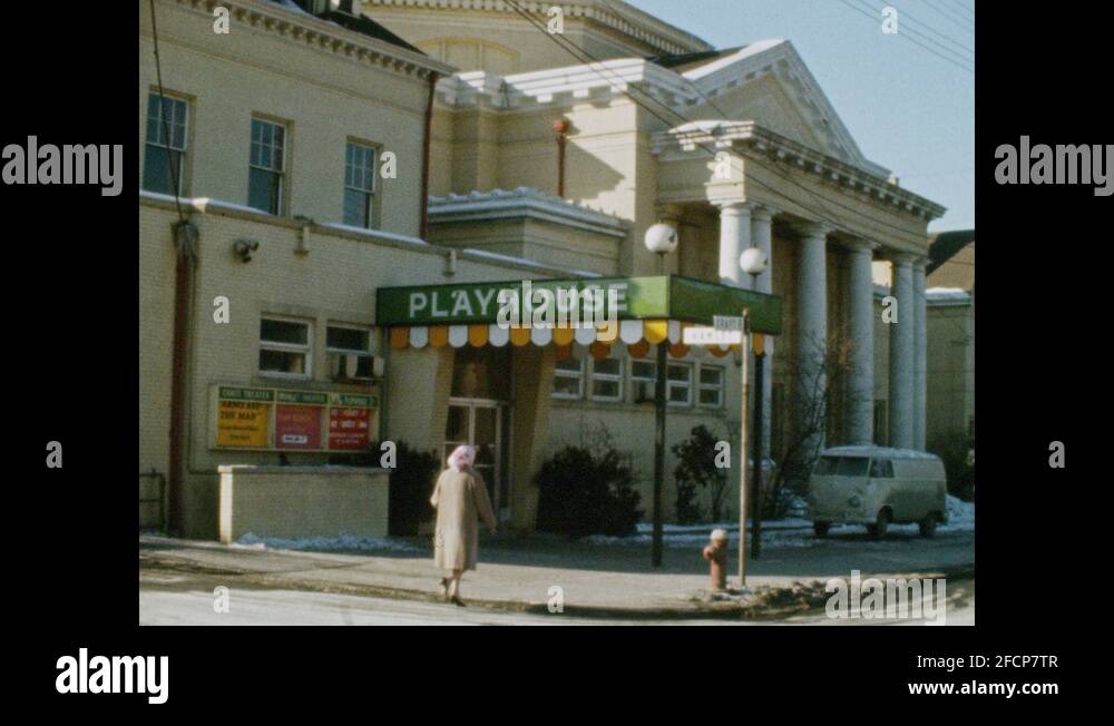 1970s: UNITED STATES: Theatre billboards and posters by the Playhouse ...