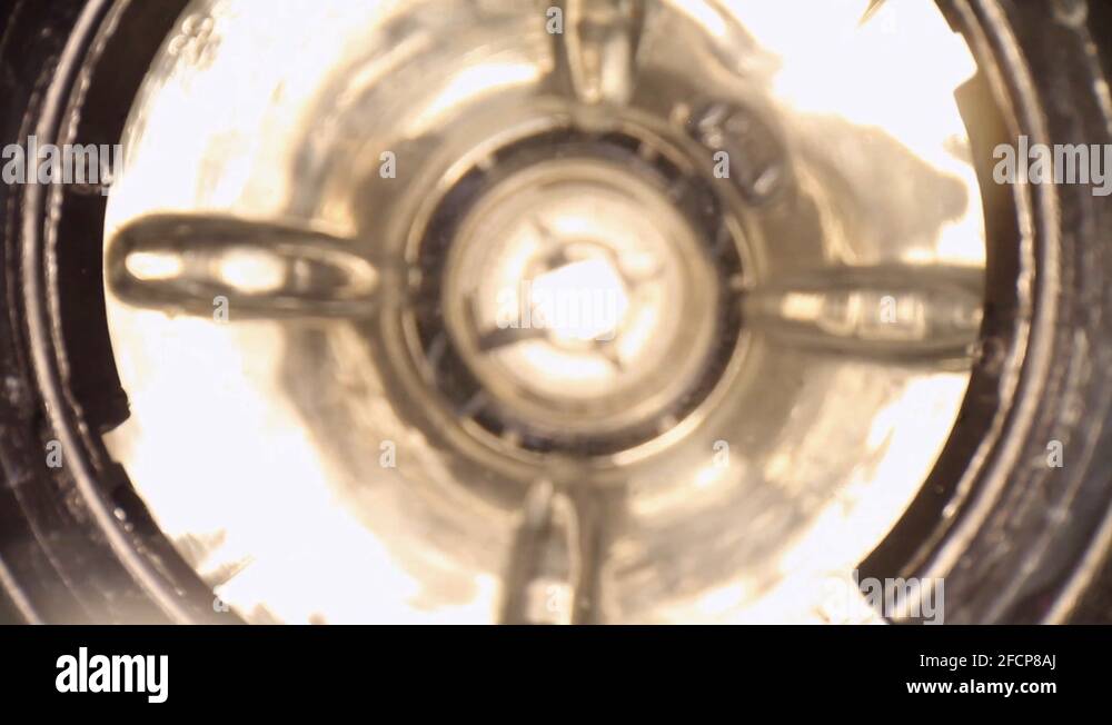 pushing into a blender filled with water, the motor starts & stops, the ...