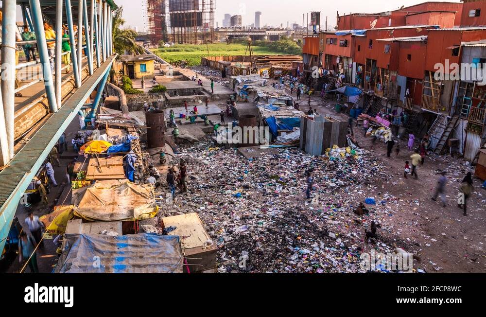 Slums next to Bandra skywalk time lapse Stock Video Footage - Alamy