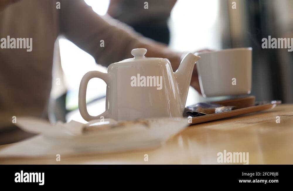 Coffee shop tea Stock Videos & Footage - HD and 4K Video Clips - Alamy