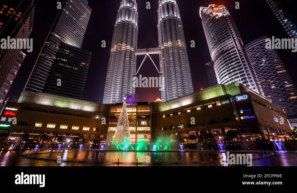 Petronas Twin Towers (KLCC) in Kuala lumpur city time lapse at night ...