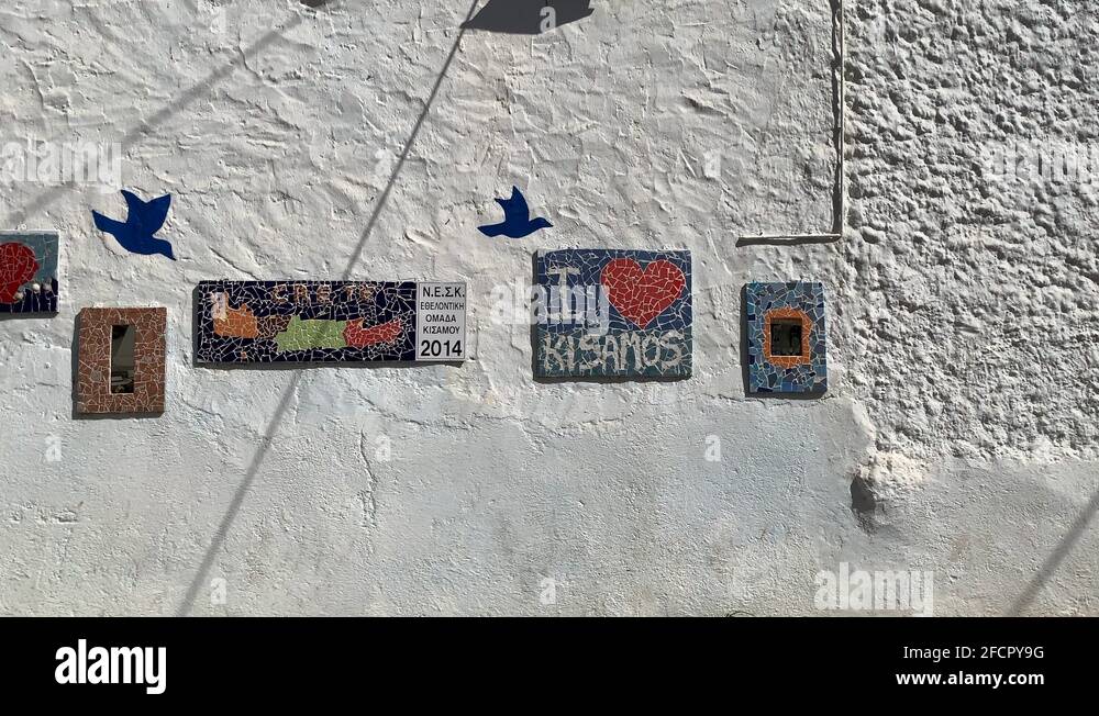 Wall full of memorial tiles in horizontal line. Wall decorated by ...