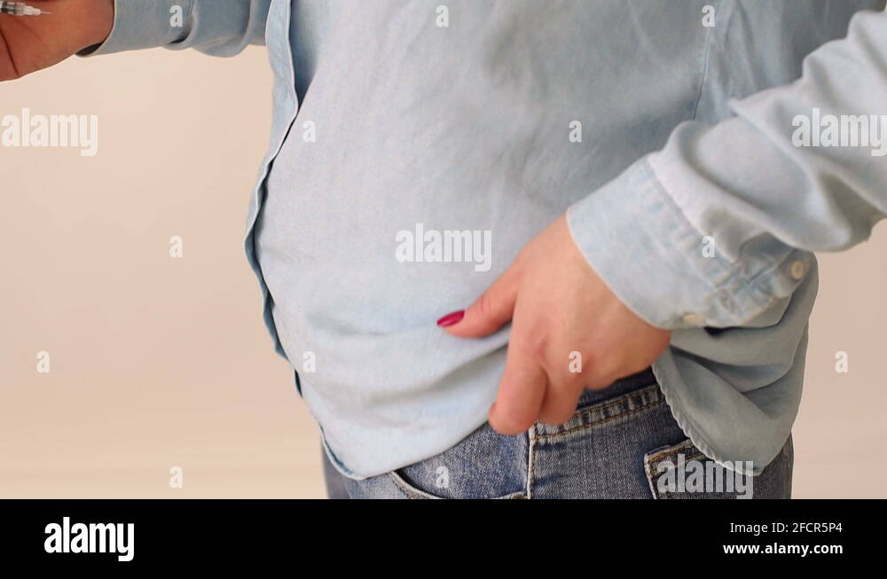 Stomach fold Stock Videos & Footage - HD and 4K Video Clips - Alamy