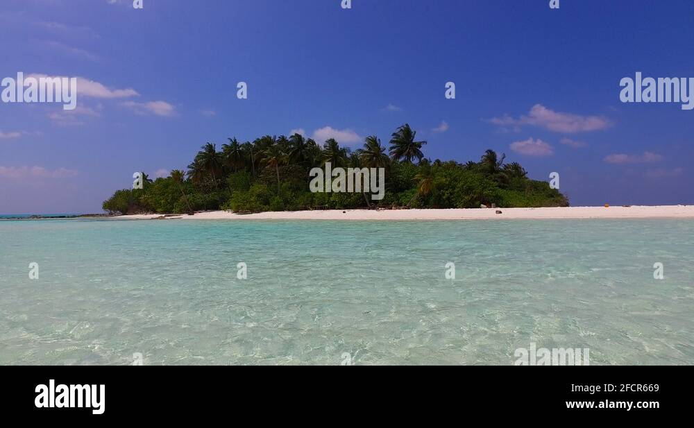 Perfect paradise tropical atoll island with a luxury resort. Aerial ...
