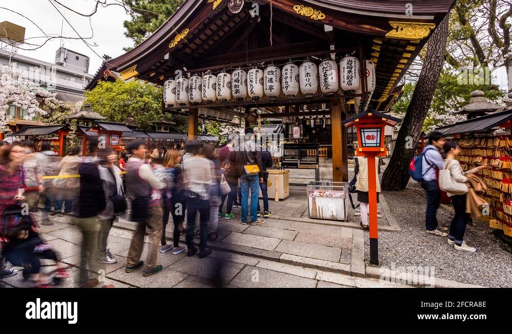 Japanese people praying at a shrine in Kyoto time lapse Stock Video ...