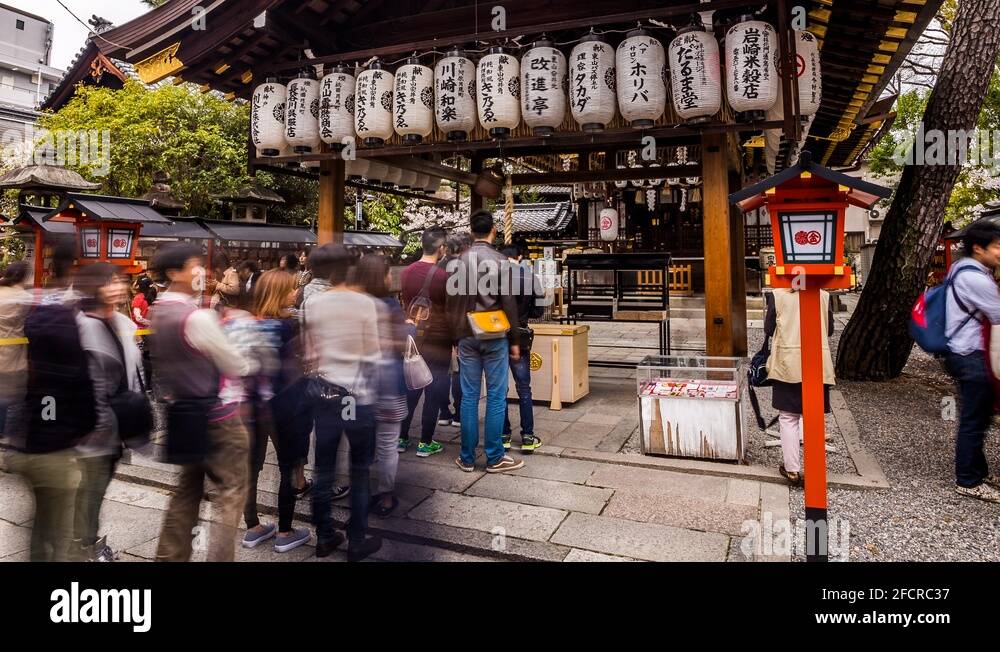 Japanese people praying at a shrine in Kyoto time lapse Stock Video ...