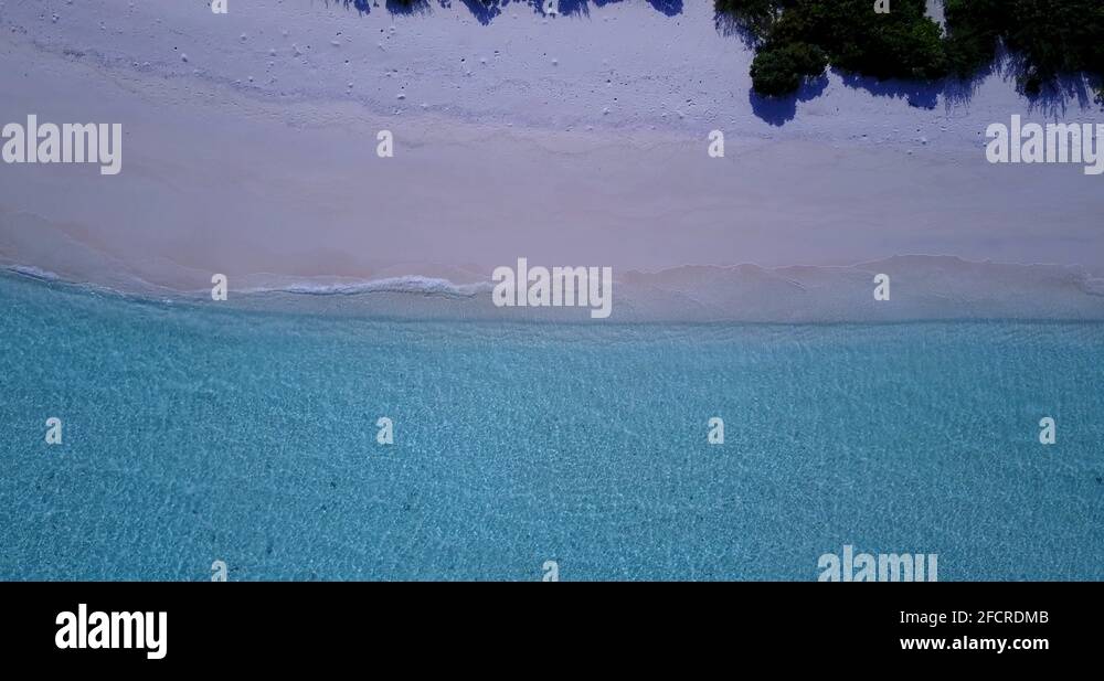 exotic small island with palm trees and white sand beaches in crystal ...