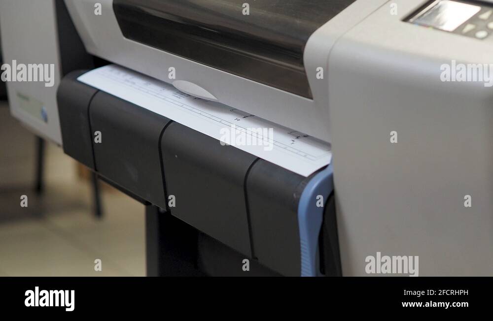 Static shot of Wide format printer, plotter is printing design draft ...