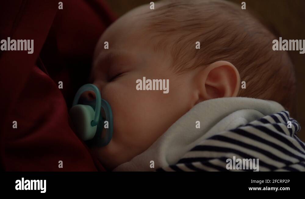 Using pacifier Stock Videos & Footage - HD and 4K Video Clips - Alamy