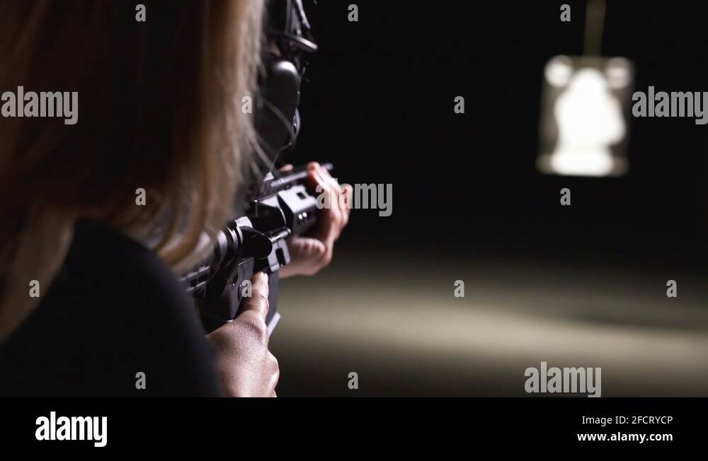 Woman aiming Stock Videos & Footage - HD and 4K Video Clips - Alamy