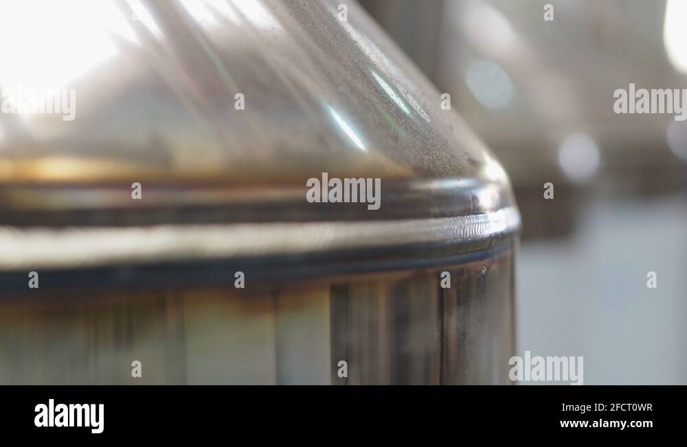 Static shot of a welding seam at a stainless steel pressure tank ...