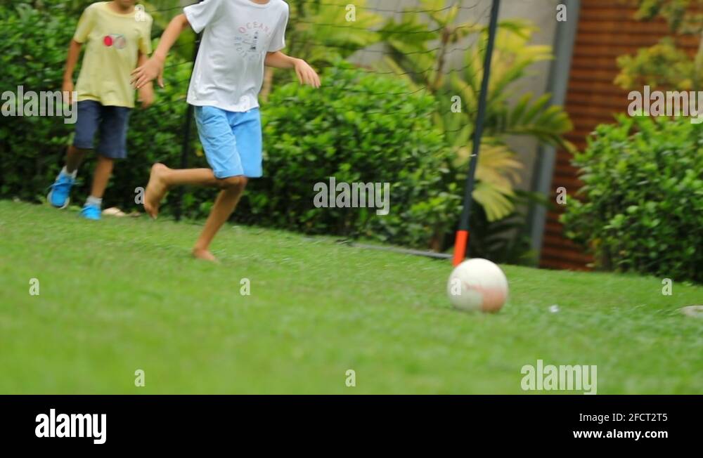 Kids playing football in garden Stock Videos & Footage - HD and 4K ...