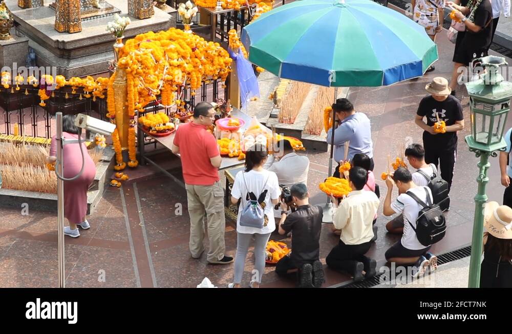 Asian People Partaking In Buddhist Erawan Shrine Ceremony Stock Video ...