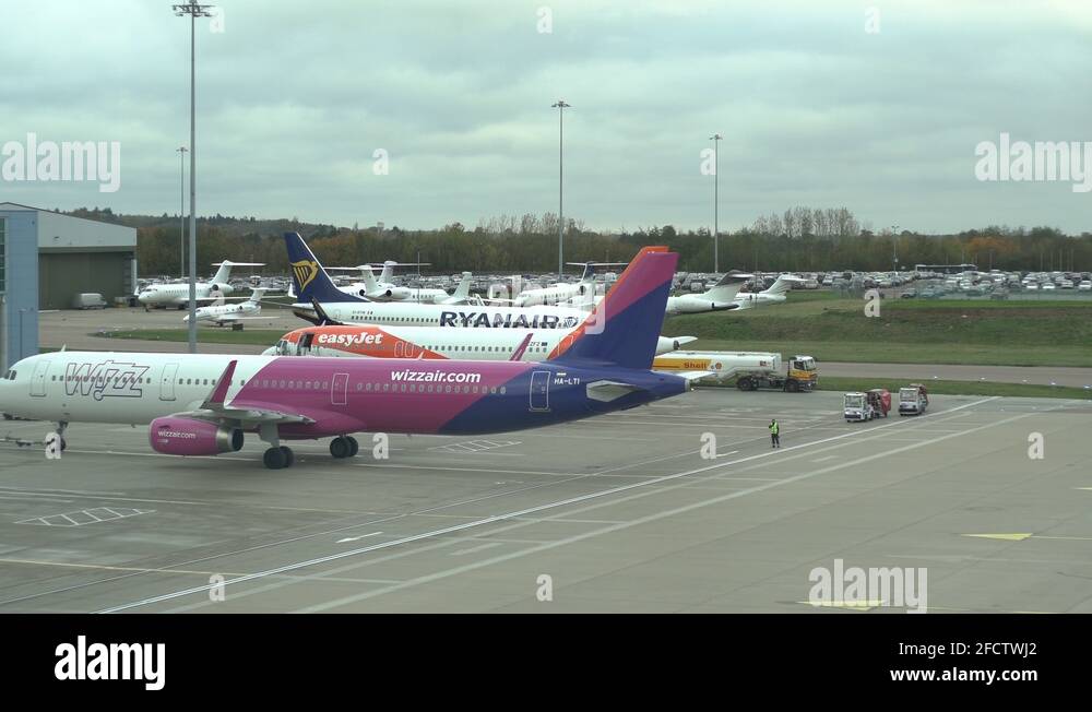 Airplane tug pushing aircraft to runway. Airplane ready for takeoff ...