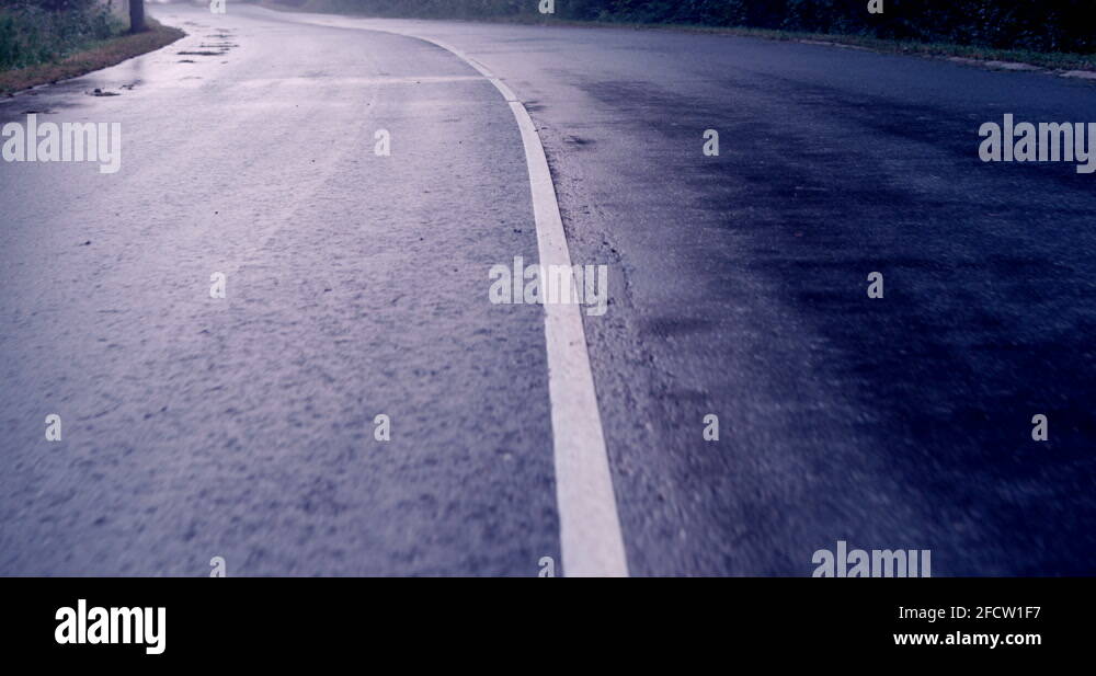 Wet road wallpaper Stock Videos & Footage - HD and 4K Video Clips - Alamy