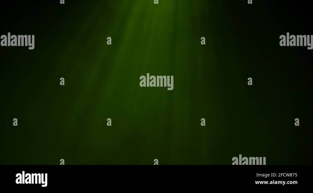 Light rays shining from above coming through deep green water Stock ...