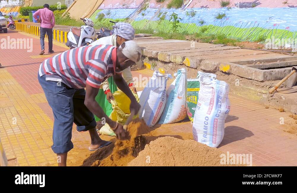 Male and female labour building Stock Videos & Footage - HD and 4K ...
