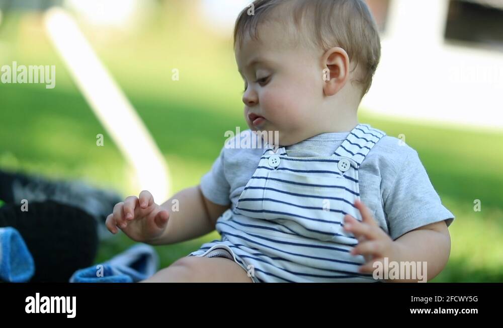 Cute baby child Stock Videos & Footage - HD and 4K Video Clips - Alamy