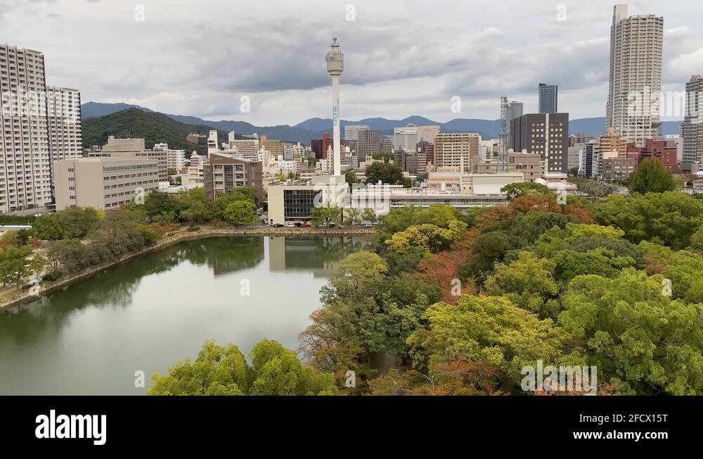 City view of Hiroshima, Japan being panned out from the windows of ...