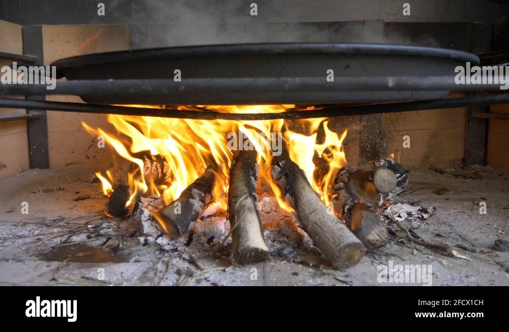 Paella on an open flame Stock Videos & Footage - HD and 4K Video Clips ...