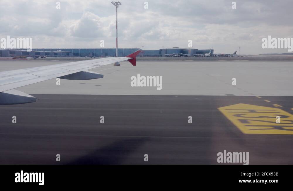 Istanbul airport seen from the plane window as the plane taxis along ...
